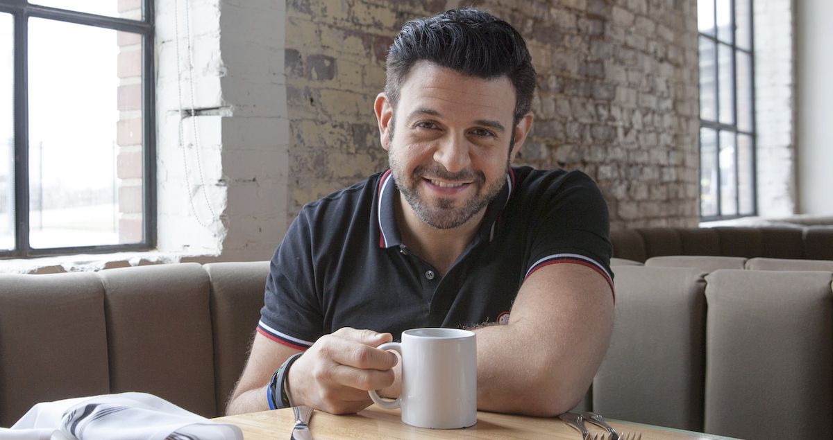 Listen: Interview with Adam Richman | 95.7 The Hog